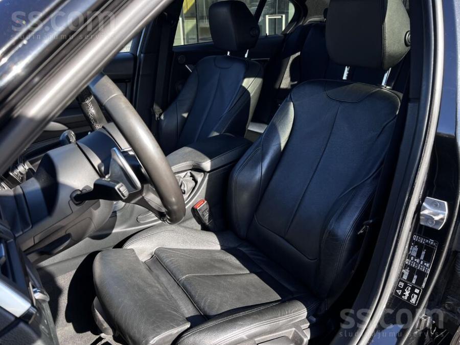 Black BMW 330 2017 in Riga, with an engine capacity of 3.00 L and mileage of 293 thousand km for 15900 €, photo 12 on AUTOMOTO.COM.LV