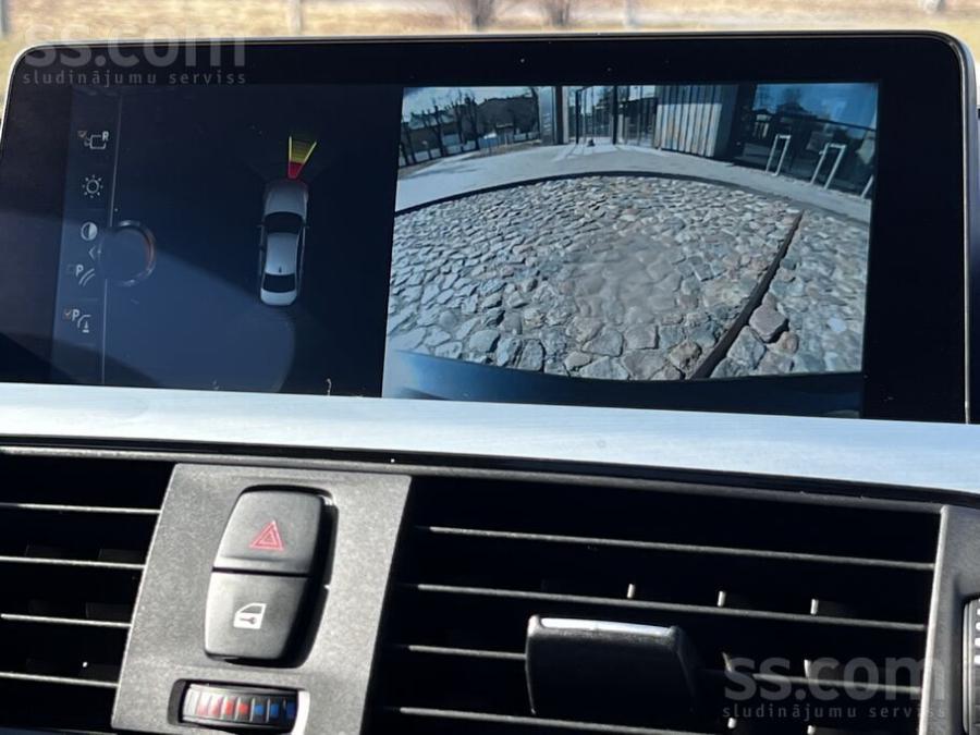 Black BMW 330 2017 in Riga, with an engine capacity of 3.00 L and mileage of 293 thousand km for 15900 €, photo 16 on AUTOMOTO.COM.LV