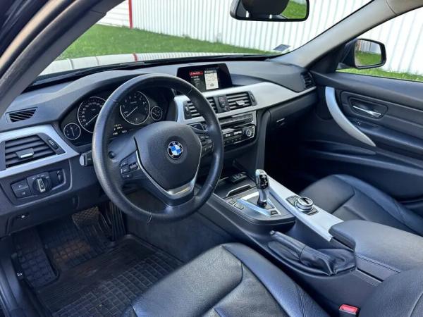 Black BMW 330 2018 in Riga, with an engine capacity of 2.00 L and mileage of 92 thousand km for 18000 €, photo 7 on AUTOMOTO.COM.LV