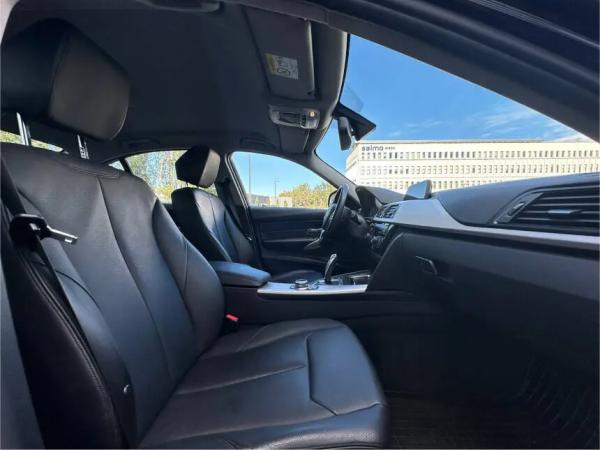 Black BMW 330 2018 in Riga, with an engine capacity of 2.00 L and mileage of 92 thousand km for 18000 €, photo 8 on AUTOMOTO.COM.LV