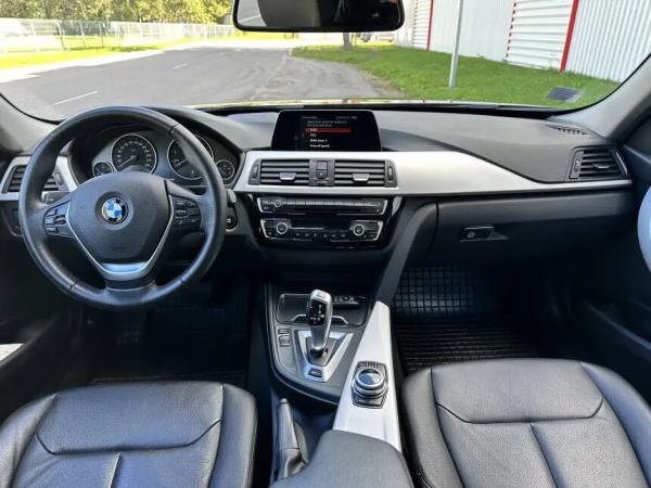 Black BMW 330 2018 in Riga, with an engine capacity of 2.00 L and mileage of 92 thousand km for 18000 €, photo 9 on AUTOMOTO.COM.LV