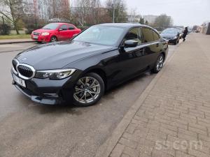 Black BMW 330 2019 in Riga, with an engine capacity of 2.00 L and mileage of 106 thousand km for 20000 €, photo 3 on AUTOMOTO.COM.LV