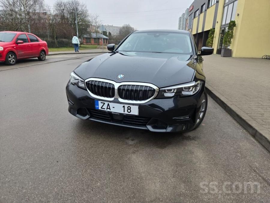 Black BMW 330 2019 in Riga, with an engine capacity of 2.00 L and mileage of 106 thousand km for 20000 €, photo 4 on AUTOMOTO.COM.LV