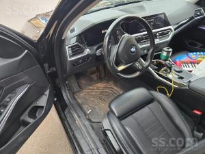 Black BMW 330 2019 in Riga, with an engine capacity of 2.00 L and mileage of 106 thousand km for 20000 €, photo 5 on AUTOMOTO.COM.LV