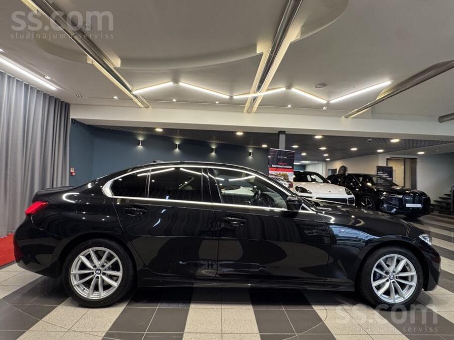 Black BMW 330 2019 in Riga, with an engine capacity of 2.00 L and mileage of 98 thousand km for 26995 €, photo 8 on AUTOMOTO.COM.LV