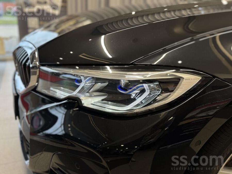 Black BMW 330 2019 in Riga, with an engine capacity of 2.00 L and mileage of 98 thousand km for 26995 €, photo 10 on AUTOMOTO.COM.LV
