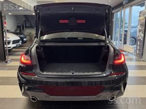Black BMW 330 2019 in Riga, with an engine capacity of 2.00 L and mileage of 98 thousand km for 26995 €, photo 12 on AUTOMOTO.COM.LV
