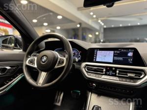 Black BMW 330 2019 in Riga, with an engine capacity of 2.00 L and mileage of 98 thousand km for 26995 €, photo 15 on AUTOMOTO.COM.LV