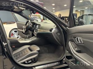 Black BMW 330 2019 in Riga, with an engine capacity of 2.00 L and mileage of 98 thousand km for 26995 €, photo 16 on AUTOMOTO.COM.LV