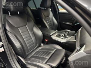 Black BMW 330 2019 in Riga, with an engine capacity of 2.00 L and mileage of 98 thousand km for 26995 €, photo 18 on AUTOMOTO.COM.LV
