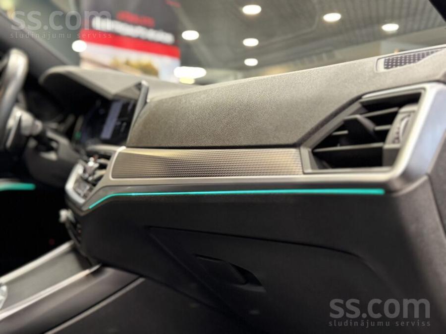 Black BMW 330 2019 in Riga, with an engine capacity of 2.00 L and mileage of 98 thousand km for 26995 €, photo 19 on AUTOMOTO.COM.LV