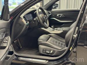 Black BMW 330 2019 in Riga, with an engine capacity of 2.00 L and mileage of 98 thousand km for 26995 €, photo 20 on AUTOMOTO.COM.LV