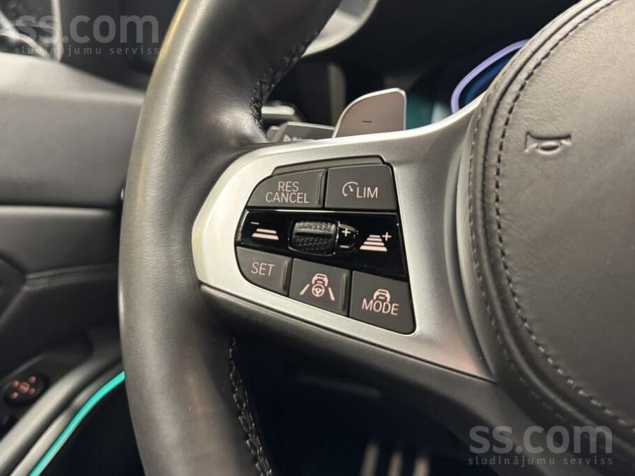 Black BMW 330 2019 in Riga, with an engine capacity of 2.00 L and mileage of 98 thousand km for 26995 €, photo 24 on AUTOMOTO.COM.LV