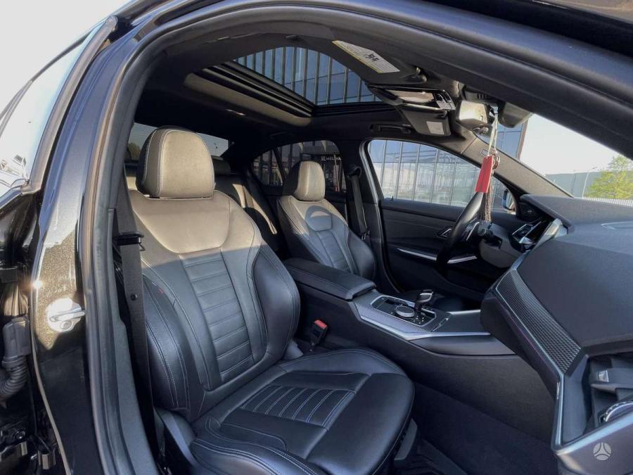 Black BMW 330 2019 in Kaunas, with an engine capacity of 2.00 L and mileage of 100 thousand km for 27300 €, photo 16 on AUTOMOTO.COM.LV