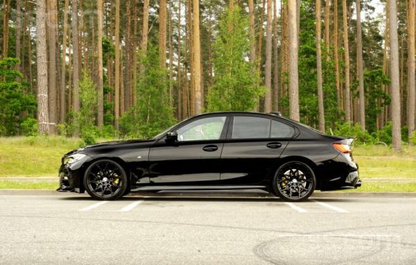 Black BMW 330 2020 in Riga, with an engine capacity of 2.00 L and mileage of 88 thousand km for 29990 €, photo 5 on AUTOMOTO.COM.LV