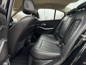 Black BMW 330 2020 in Riga, with an engine capacity of 3.00 L and mileage of 181 thousand km for 23500 €, photo 5 on AUTOMOTO.COM.LV