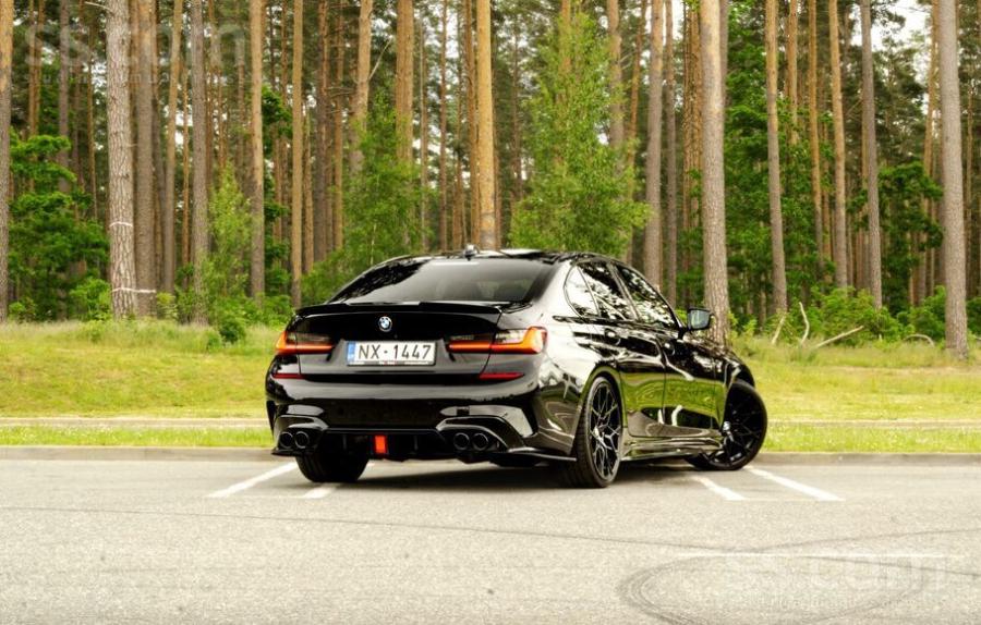Black BMW 330 2020 in Riga, with an engine capacity of 2.00 L and mileage of 88 thousand km for 28590 €, photo 6 on AUTOMOTO.COM.LV