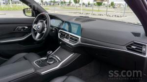 Black BMW 330 2020 in Riga, with an engine capacity of 2.00 L and mileage of 88 thousand km for 28590 €, photo 11 on AUTOMOTO.COM.LV