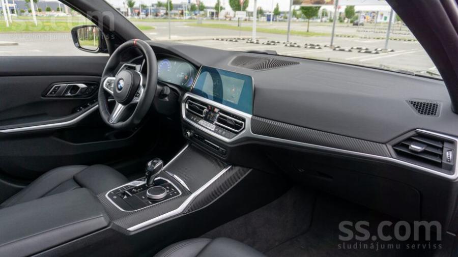 Black BMW 330 2020 in Riga, with an engine capacity of 2.00 L and mileage of 88 thousand km for 28590 €, photo 11 on AUTOMOTO.COM.LV
