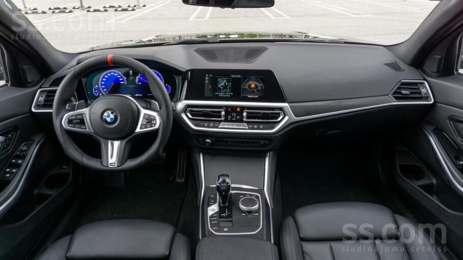 Black BMW 330 2020 in Riga, with an engine capacity of 2.00 L and mileage of 88 thousand km for 28590 €, photo 12 on AUTOMOTO.COM.LV