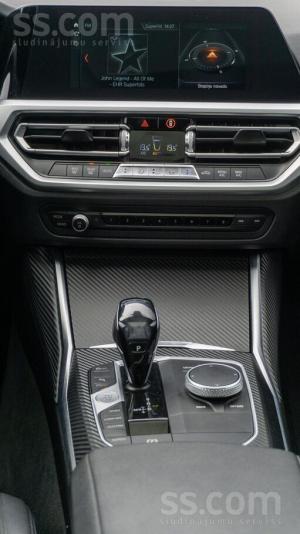 Black BMW 330 2020 in Riga, with an engine capacity of 2.00 L and mileage of 88 thousand km for 28590 €, photo 13 on AUTOMOTO.COM.LV