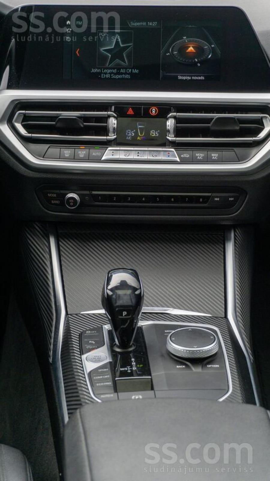 Black BMW 330 2020 in Riga, with an engine capacity of 2.00 L and mileage of 88 thousand km for 28590 €, photo 13 on AUTOMOTO.COM.LV