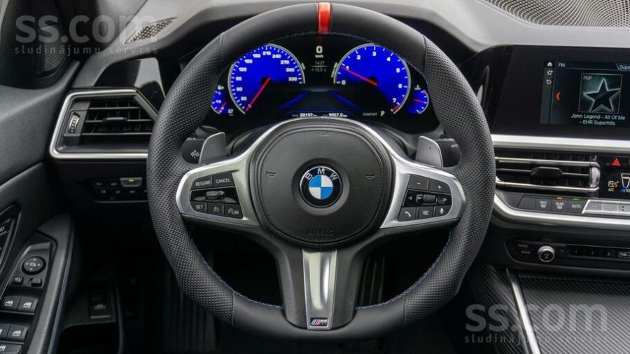 Black BMW 330 2020 in Riga, with an engine capacity of 2.00 L and mileage of 88 thousand km for 28590 €, photo 14 on AUTOMOTO.COM.LV
