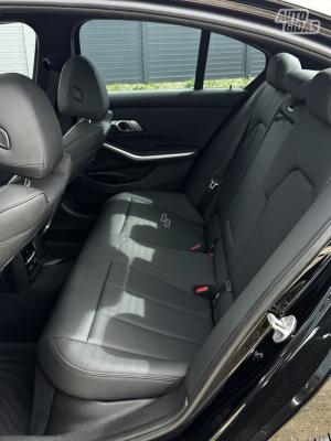 Black BMW 330 2021 in Klaipeda, with an engine capacity of 2.00 L and mileage of 108 thousand km for 24999 €, photo 13 on AUTOMOTO.COM.LV