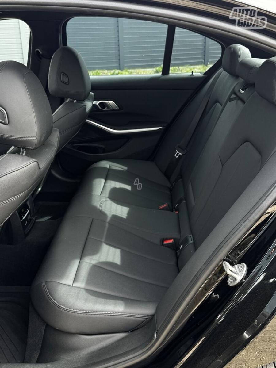 Black BMW 330 2021 in Klaipeda, with an engine capacity of 2.00 L and mileage of 108 thousand km for 24999 €, photo 13 on AUTOMOTO.COM.LV