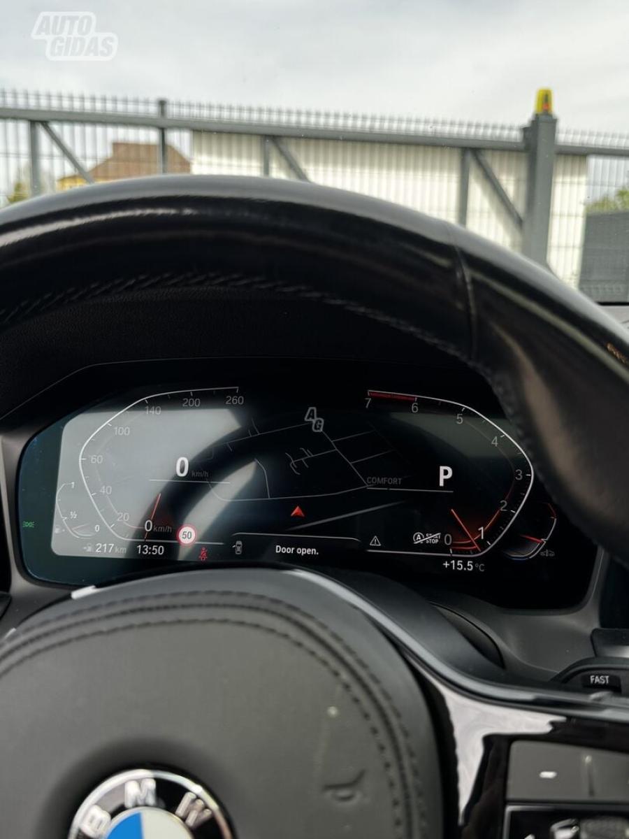 Black BMW 330 2021 in Klaipeda, with an engine capacity of 2.00 L and mileage of 108 thousand km for 24999 €, photo 14 on AUTOMOTO.COM.LV