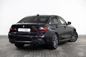Black BMW 330 2021 in Vilnius, with an engine capacity of 2.00 L and mileage of 119 thousand km for 32752 €, photo 11 on AUTOMOTO.COM.LV