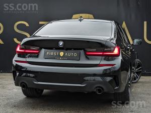 Black BMW 330 2021 in Tukums, with an engine capacity of 2.00 L and mileage of 168 thousand km for 27700 €, photo 4 on AUTOMOTO.COM.LV