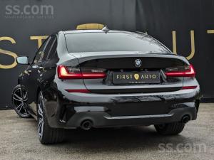 Black BMW 330 2021 in Tukums, with an engine capacity of 2.00 L and mileage of 168 thousand km for 27700 €, photo 5 on AUTOMOTO.COM.LV