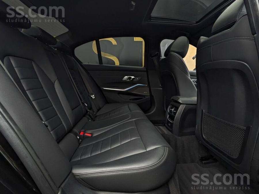 Black BMW 330 2021 in Tukums, with an engine capacity of 2.00 L and mileage of 168 thousand km for 27700 €, photo 8 on AUTOMOTO.COM.LV