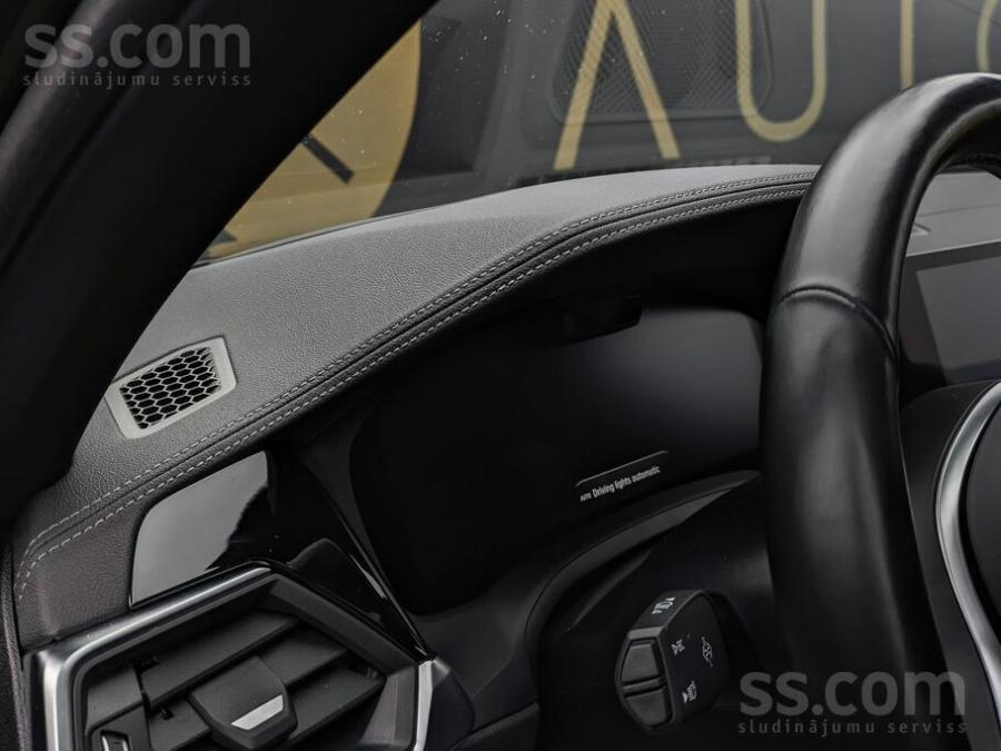 Black BMW 330 2021 in Tukums, with an engine capacity of 2.00 L and mileage of 168 thousand km for 27700 €, photo 23 on AUTOMOTO.COM.LV