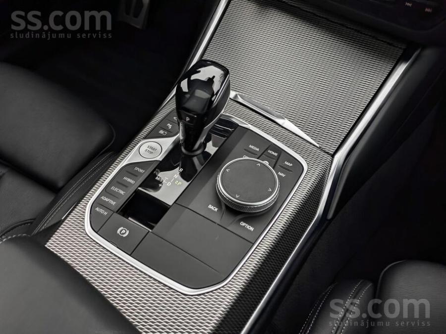 Black BMW 330 2021 in Tukums, with an engine capacity of 2.00 L and mileage of 168 thousand km for 27700 €, photo 29 on AUTOMOTO.COM.LV