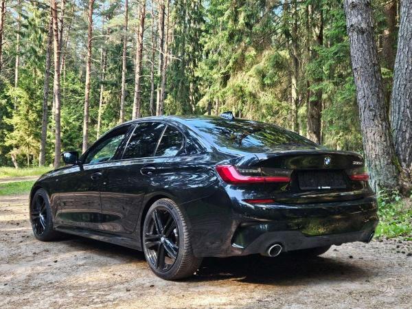 Black BMW 330 2021 in Kaunas, with an engine capacity of 3.00 L and mileage of 198 thousand km for 25450 €, photo 4 on AUTOMOTO.COM.LV