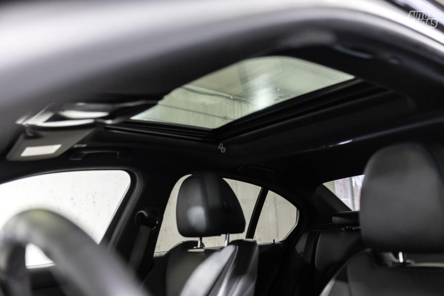 Black BMW 330 2021 in Vilnius, with an engine capacity of 2.00 L and mileage of 119 thousand km for 30556 €, photo 32 on AUTOMOTO.COM.LV