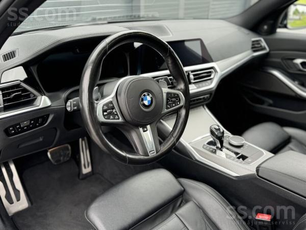 Black BMW 330 2021 in Riga, with an engine capacity of 2.00 L and mileage of 169 thousand km for 27650 €, photo 9 on AUTOMOTO.COM.LV