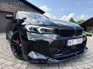 Black BMW 330 2021 in Bauska, with an engine capacity of 3.00 L and mileage of 48 thousand km for 35777 €, photo  on AUTOMOTO.COM.LV