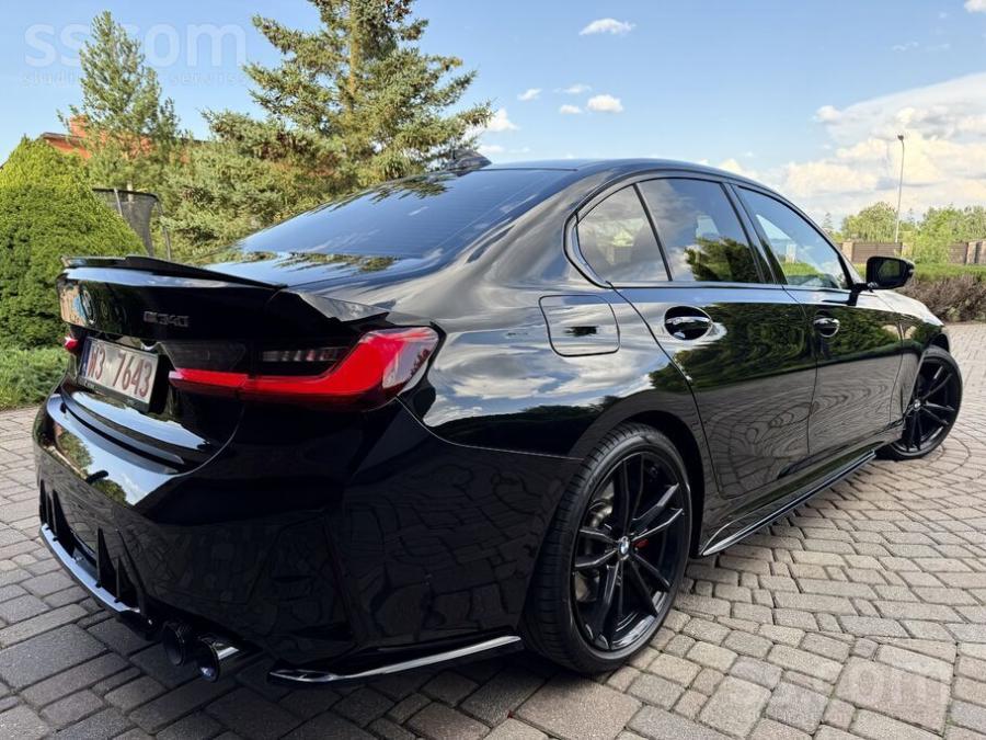 Black BMW 330 2021 in Bauska, with an engine capacity of 3.00 L and mileage of 48 thousand km for 35777 €, photo 5 on AUTOMOTO.COM.LV
