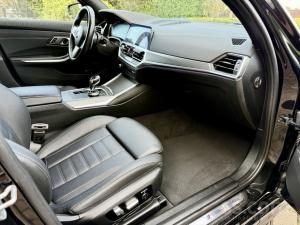 Black BMW 330 2021 in Bauska, with an engine capacity of 3.00 L and mileage of 48 thousand km for 35777 €, photo 14 on AUTOMOTO.COM.LV