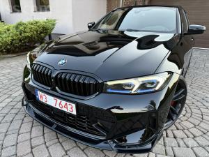 Black BMW 330 2021 in Bauska, with an engine capacity of 3.00 L and mileage of 48 thousand km for 35777 €, photo 34 on AUTOMOTO.COM.LV