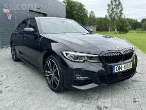 Black BMW 330 2021 in Riga, with an engine capacity of 2.00 L and mileage of 171 thousand km for 27500 €, photo 4 on AUTOMOTO.COM.LV