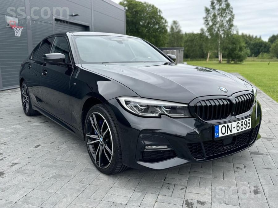 Black BMW 330 2021 in Riga, with an engine capacity of 2.00 L and mileage of 171 thousand km for 27500 €, photo 4 on AUTOMOTO.COM.LV