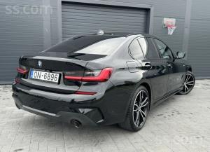 Black BMW 330 2021 in Riga, with an engine capacity of 2.00 L and mileage of 171 thousand km for 27500 €, photo 5 on AUTOMOTO.COM.LV