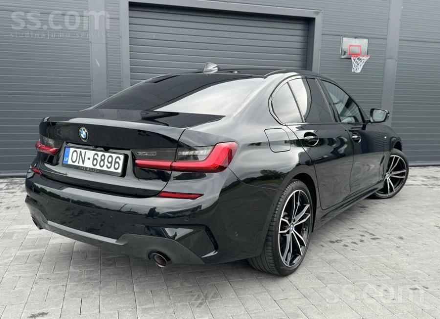 Black BMW 330 2021 in Riga, with an engine capacity of 2.00 L and mileage of 171 thousand km for 27500 €, photo 5 on AUTOMOTO.COM.LV