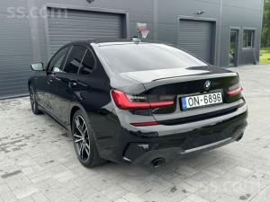 Black BMW 330 2021 in Riga, with an engine capacity of 2.00 L and mileage of 171 thousand km for 27500 €, photo 6 on AUTOMOTO.COM.LV