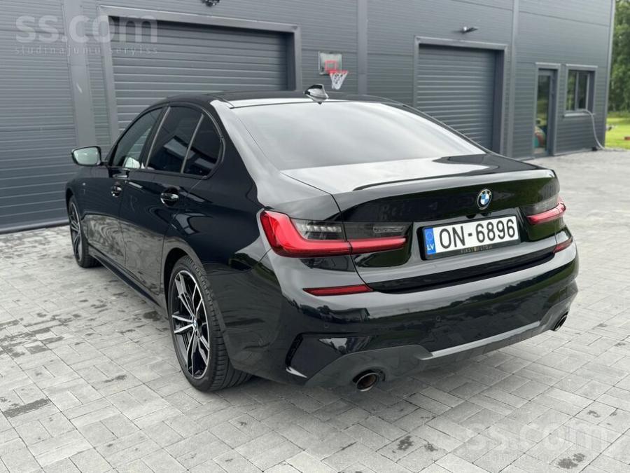 Black BMW 330 2021 in Riga, with an engine capacity of 2.00 L and mileage of 171 thousand km for 27500 €, photo 6 on AUTOMOTO.COM.LV