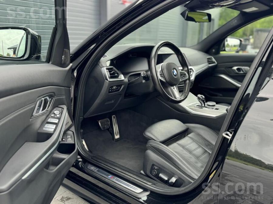 Black BMW 330 2021 in Riga, with an engine capacity of 2.00 L and mileage of 171 thousand km for 27500 €, photo 7 on AUTOMOTO.COM.LV